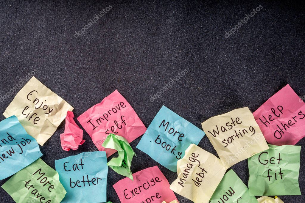Objetivos de año nuevo o resoluciones sobre pegatinas de papel de ...