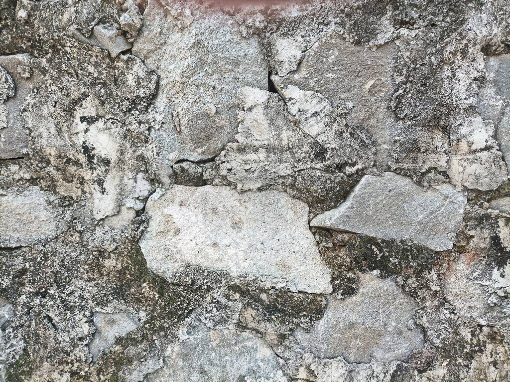 Una superficie de piedra rugosa que muestra la belleza de las texturas ...
