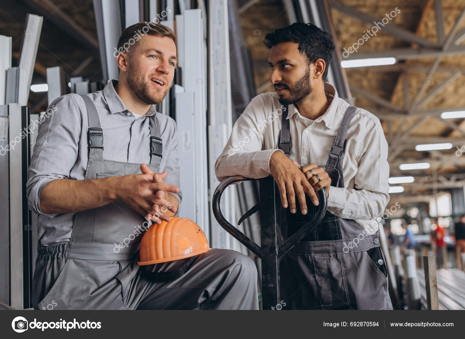 Portrait Two International Workers Wearing Hardhats Taking Break Work ...