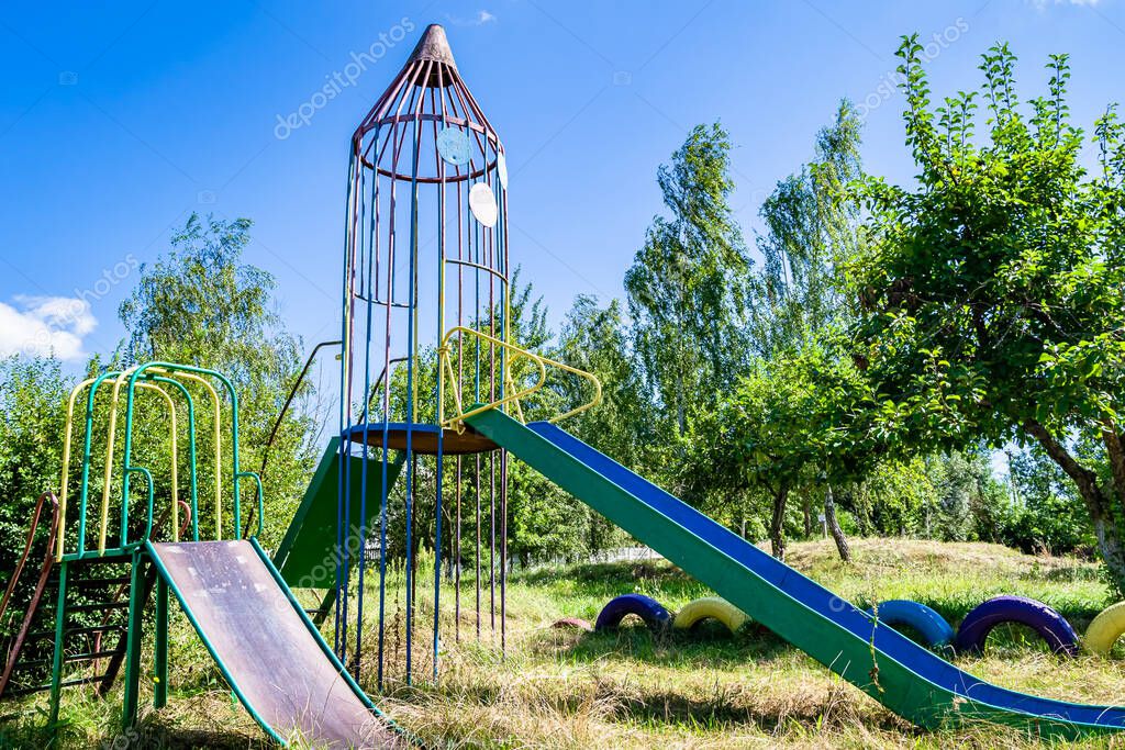 Photography on theme empty playground with metal slide for kids on ...