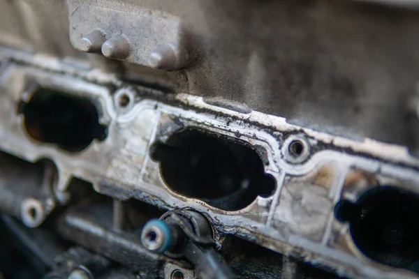 Dirty intake manifold. Close up of dirty intake manifold ports. Engine ...