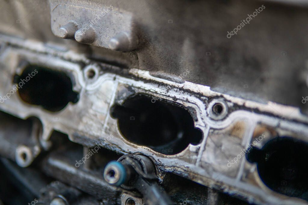 Dirty intake manifold. Close up of dirty intake manifold ports. Engine ...