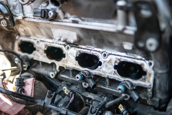 Car repair concept. dirty engine Intake Close up manifold ports. car ...