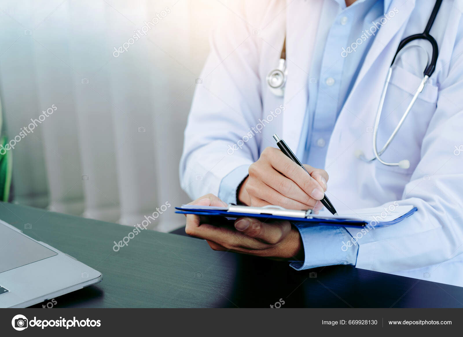 Doctor Hand Holding Pen Writing Patient History List Clipboard ...