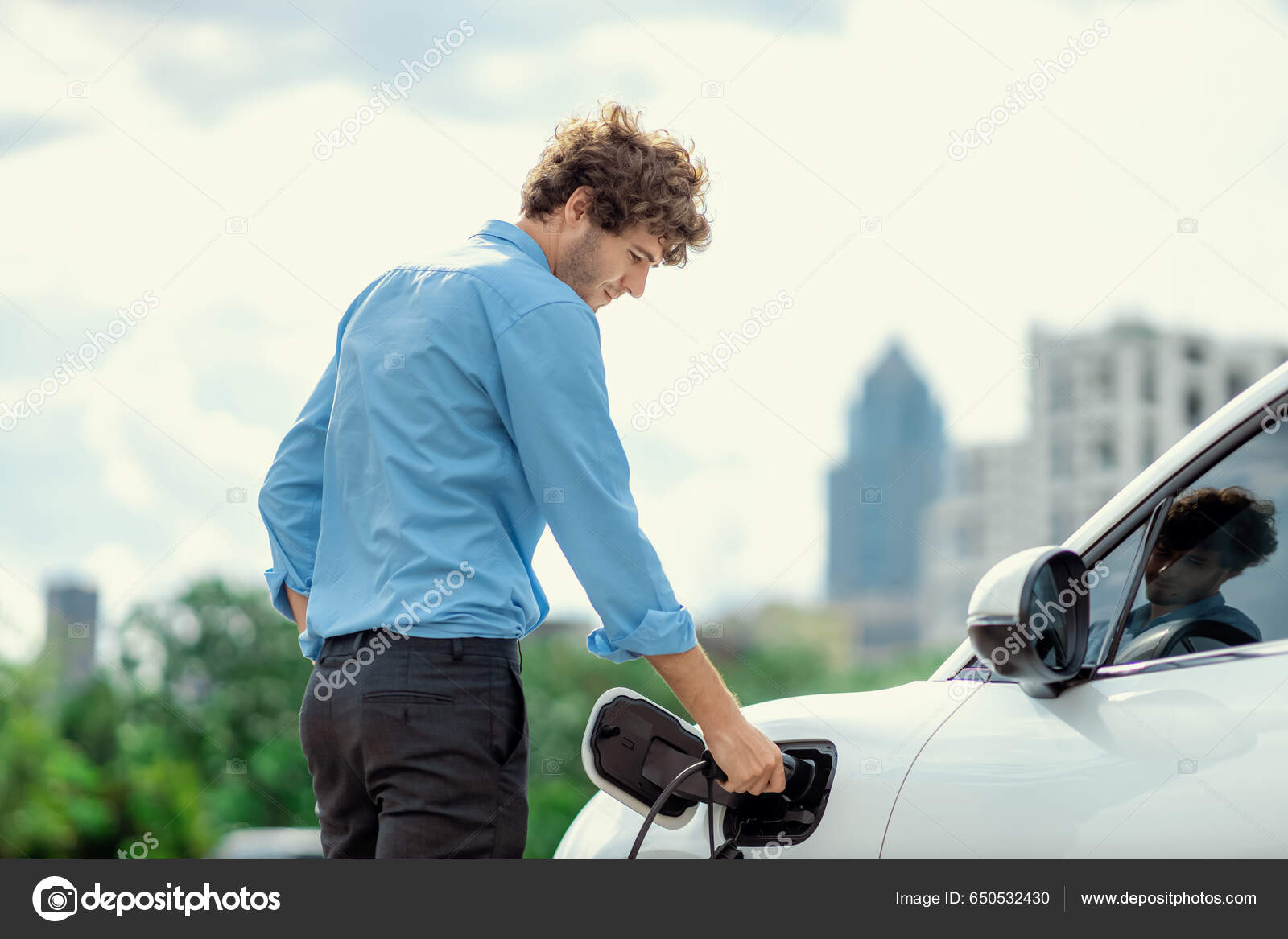 Progressive Businessman Insert Charger Plug Charging Station His ...