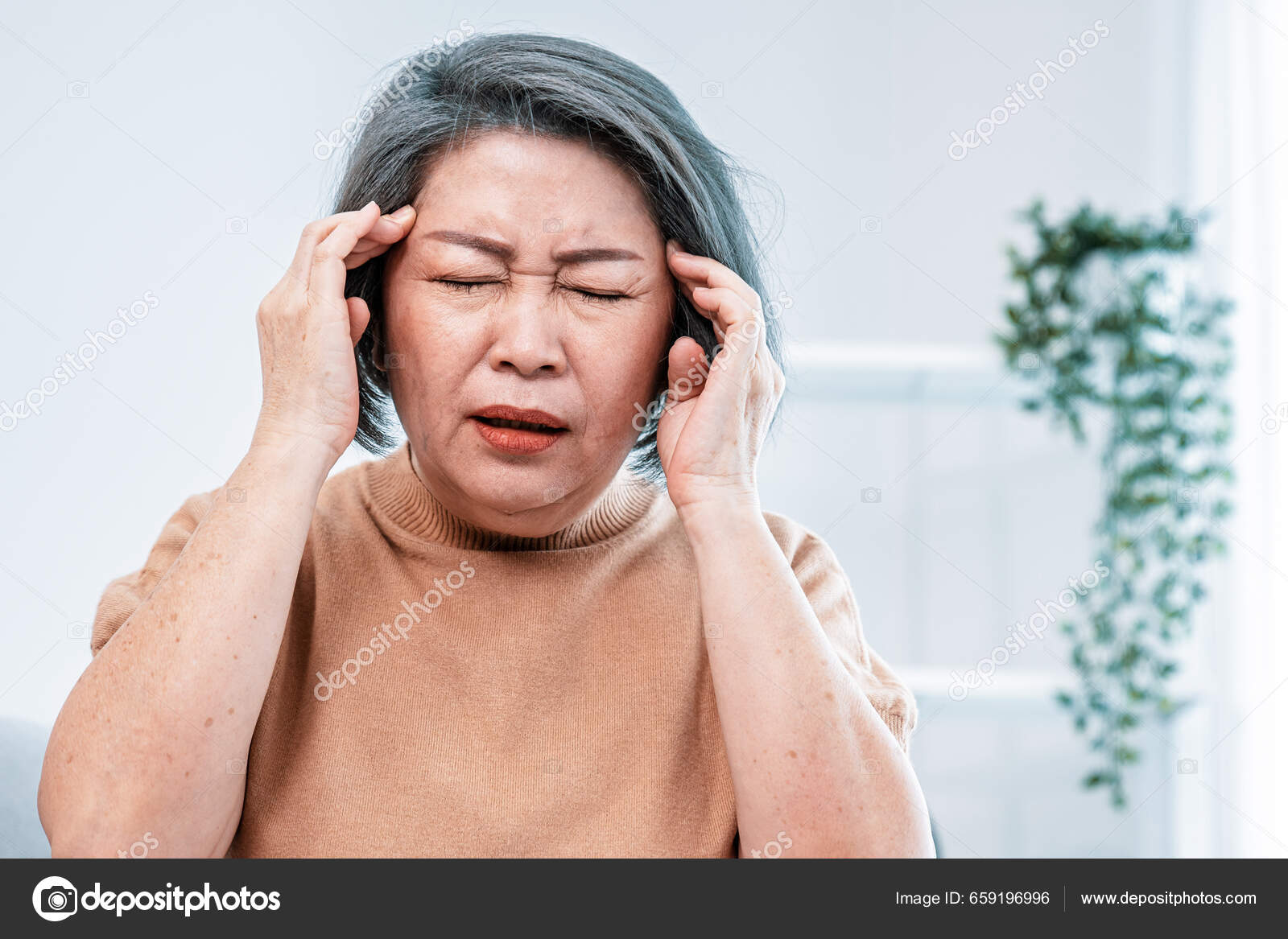 Agonizing Senior Woman Headache Compress Her Temple Both Hands Her ...