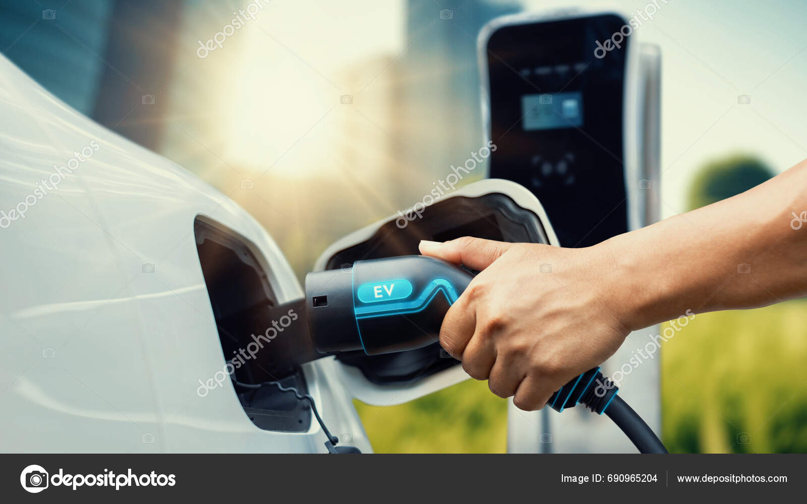 Hand Insert Charger Recharge Electric Car Charging Station Displaying ...